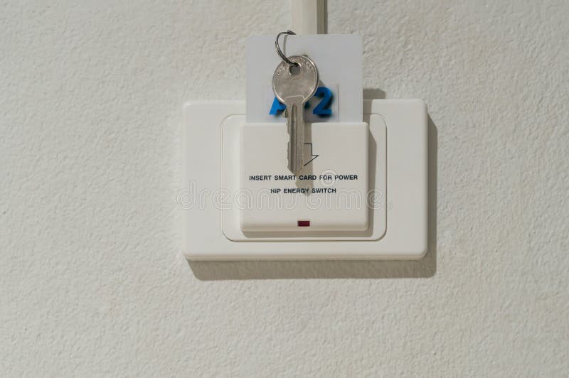 Smart Card with Key Inserted into White Socket with Text Reading Insert ...