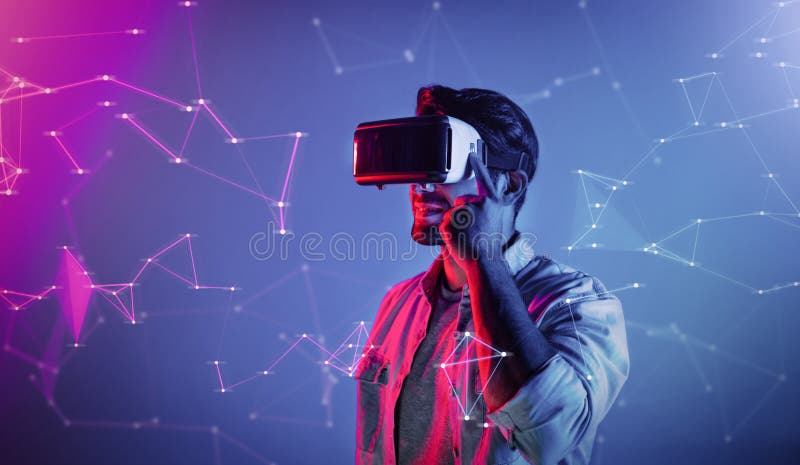 Smart Caucasian Man Wearing VR Glasses while Standing at Neon Light ...