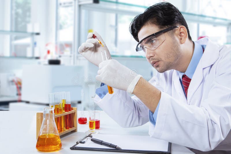 Smart Chemist Doing Chemical Test in Lab Stock Image - Image of glove ...