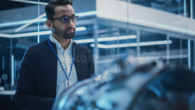 Smart Chief Engineer in Glasses Explaining the Advanced Technology of a ...