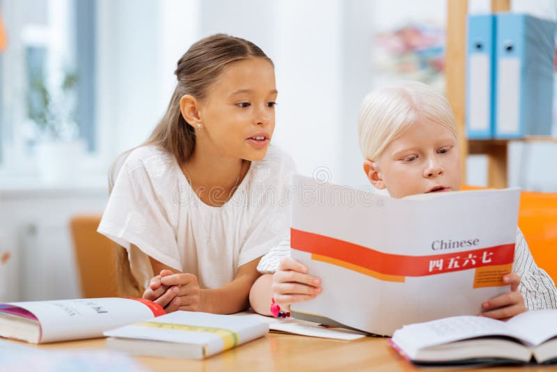 Smart Children Learning Chinese Together at Home Stock Photo - Image of ...