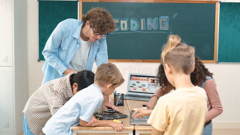 Smart Children Working on Electronic Board while Teacher Using Tablet ...