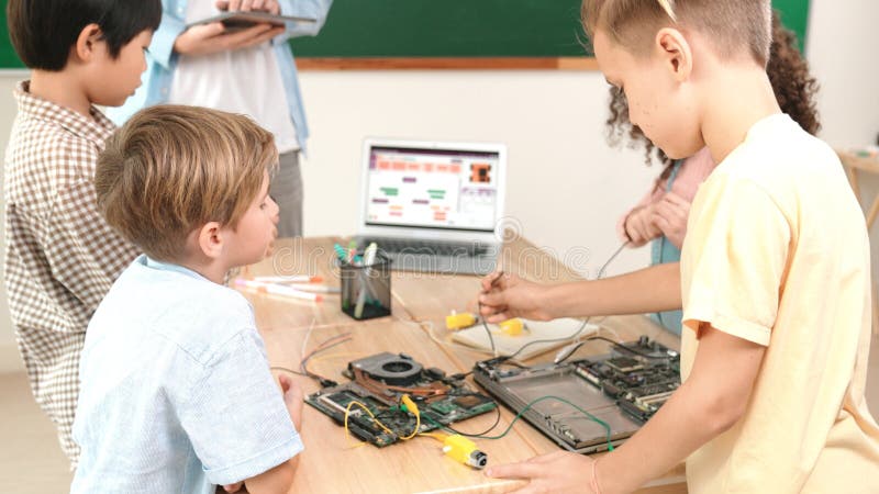 Smart Children Working on Electronic Board while Teacher Using Tablet ...