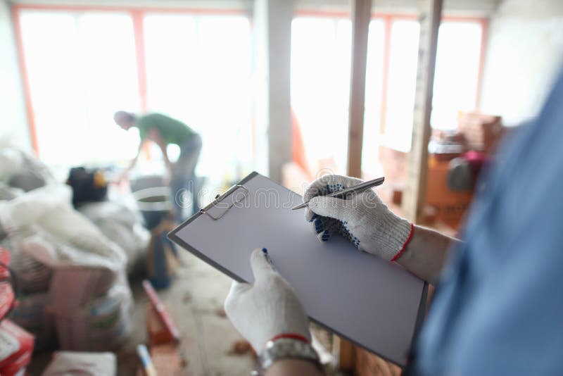 Smart Constructor Noting Something Stock Photo - Image of checking ...