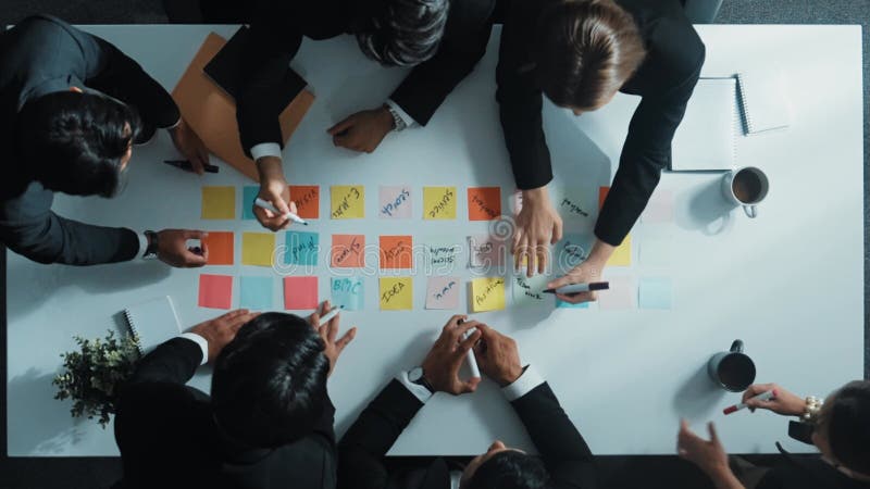 Smart Business People Writing and Brainstorming Business Idea ...