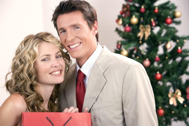 A happy christmas couple stock image. Image of husband - 3208677