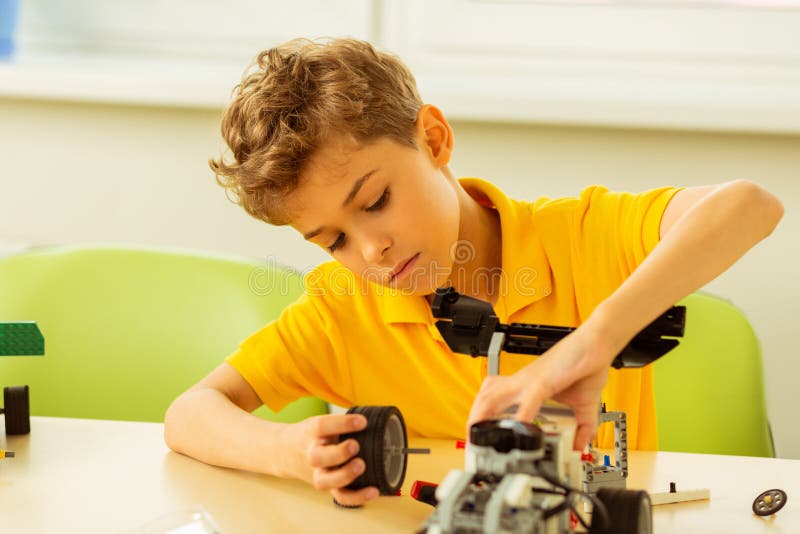 182 Boy Fixing Robot Stock Photos - Free & Royalty-Free Stock Photos ...