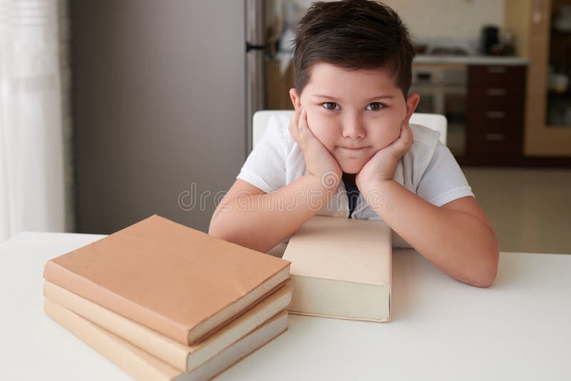 Smart Determined Little Boy Stock Photo - Image of studying, education ...