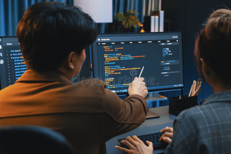 Smart It Developer Looking At Coding Program Application At Back Side