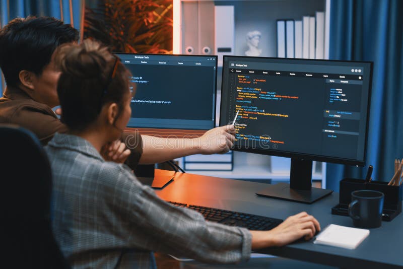 Smart It Developer Looking At Coding Program Application At Back Side