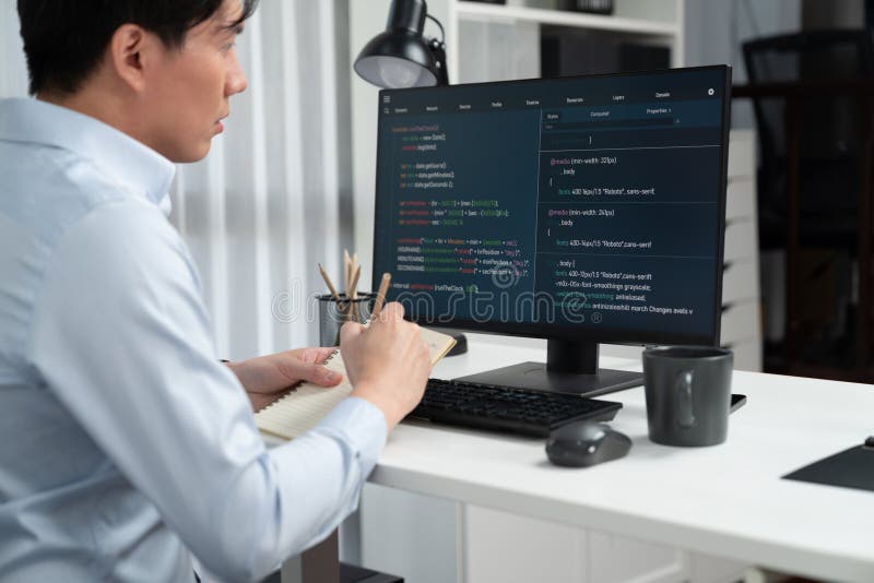 Smart It Developer Looking At Coding Program Application On Computer