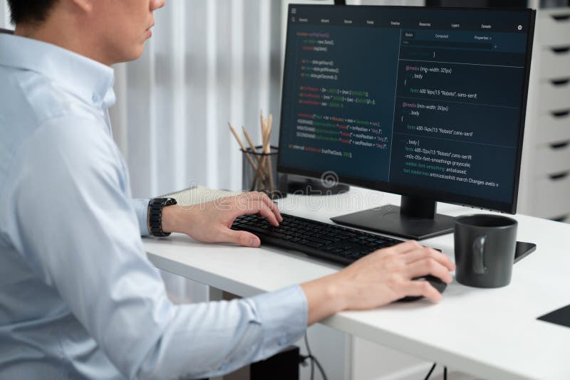 Smart It Developer Looking At Coding Program Application On Computer