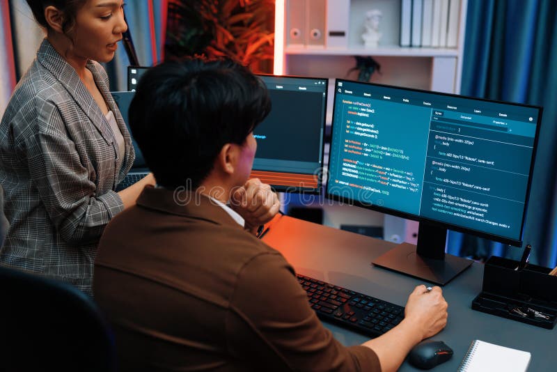 Smart It Developer Looking At Coding Program Application At Back Side