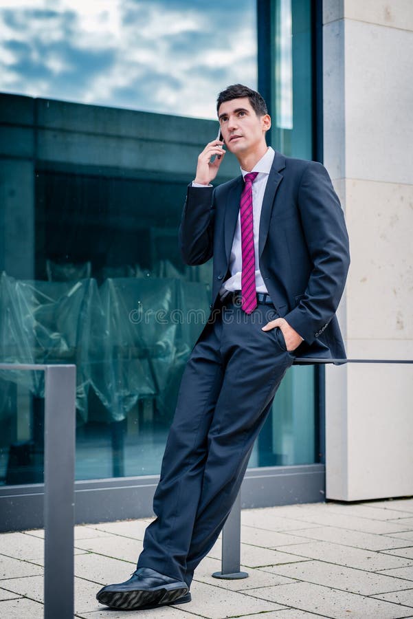 Smart Dressed Man Talking in Phone Stock Photo - Image of standing ...