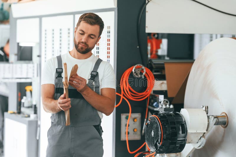 Smart Engineer. Handsome Man is Working at the Factory of Creating Eco ...
