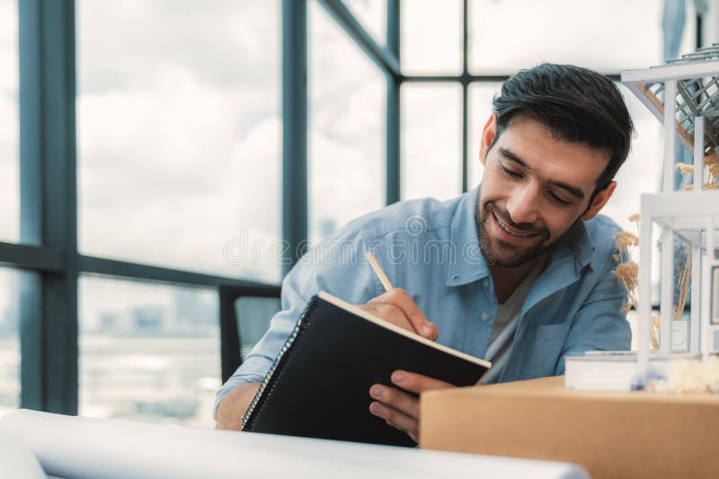 Smart Engineer Inspecting House Model Structure while Taking a Note ...