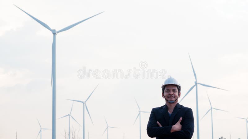 Smart Engineer Man Standing with Wind Turbine.16:9 Style Stock Image ...