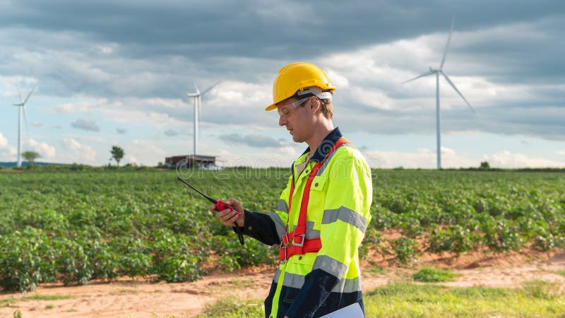 Smart Engineer with Protective Helmet on Head, Using Walkie Talkie at ...