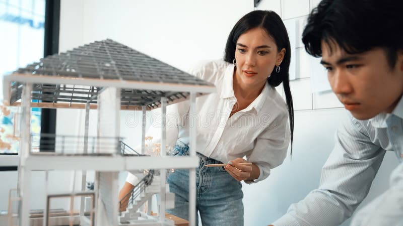 Smart Engineer Team Focusing on Checking the House Model Structure ...