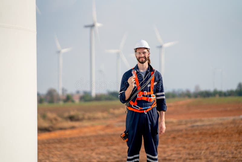 Smart Engineer or Technician Man Stand with Holding Light Bulb and Look ...