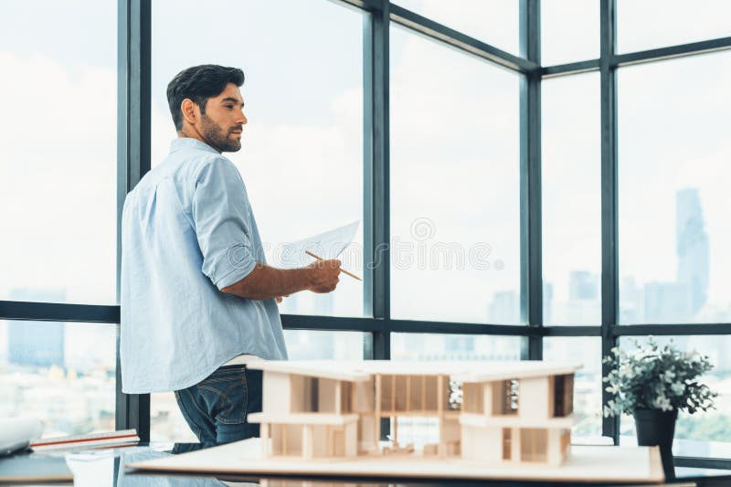 Smart Engineer Walking Around while Checking House Model Construction ...