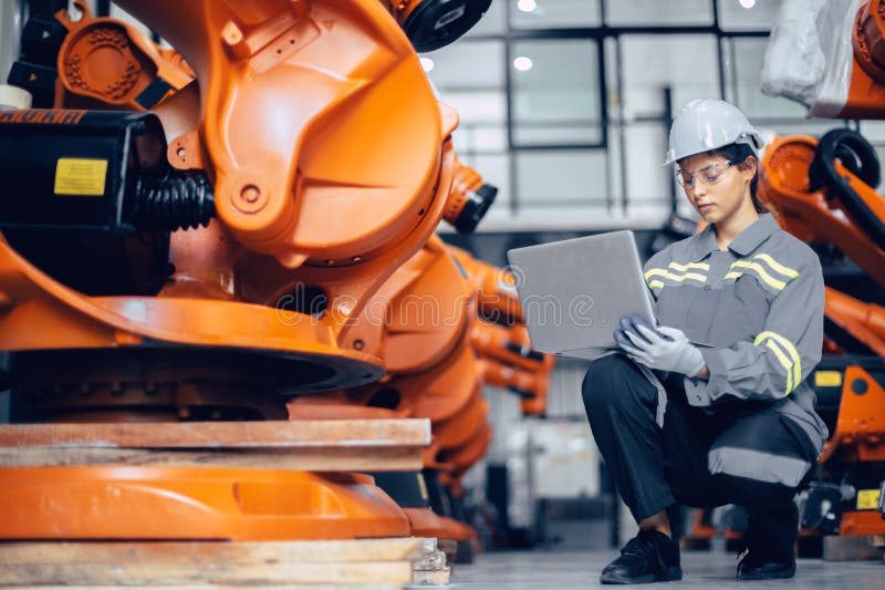 Smart Engineer Working Woman Working Machine Inspector with Laptop ...