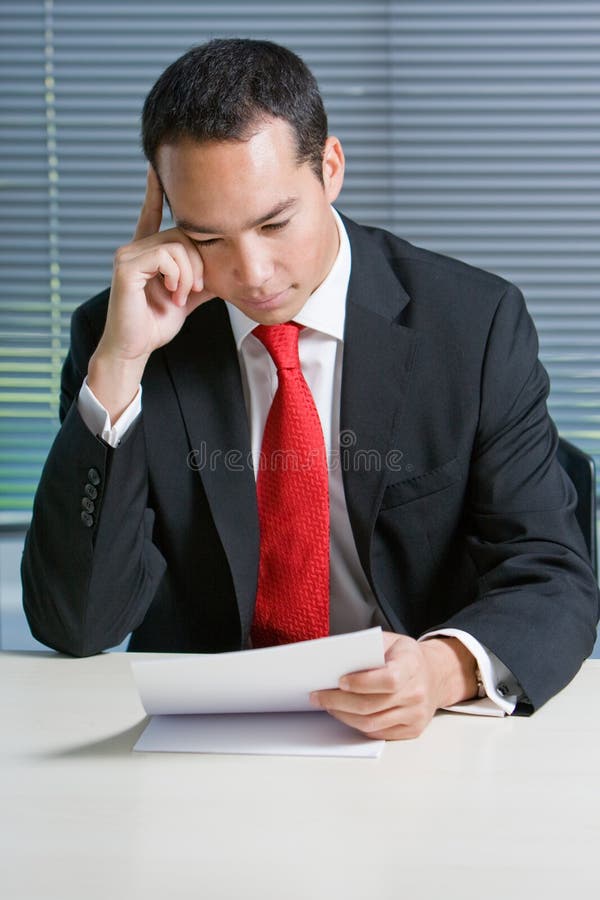 Smart Eurasian Business Man Browsing Documents Stock Image - Image of ...