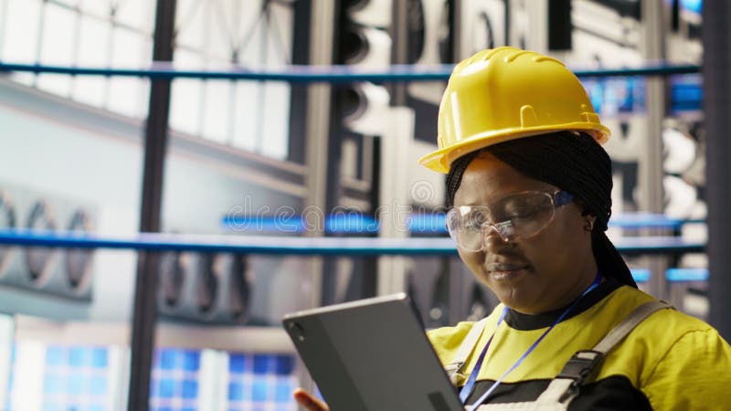 Smart Factory Engineer Using Tablet To Analyze IoT Sensors Data Stock ...