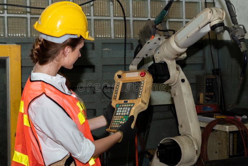 Smart Factory Job Worker Control Robotic Arm in Manufacturing Workshop ...