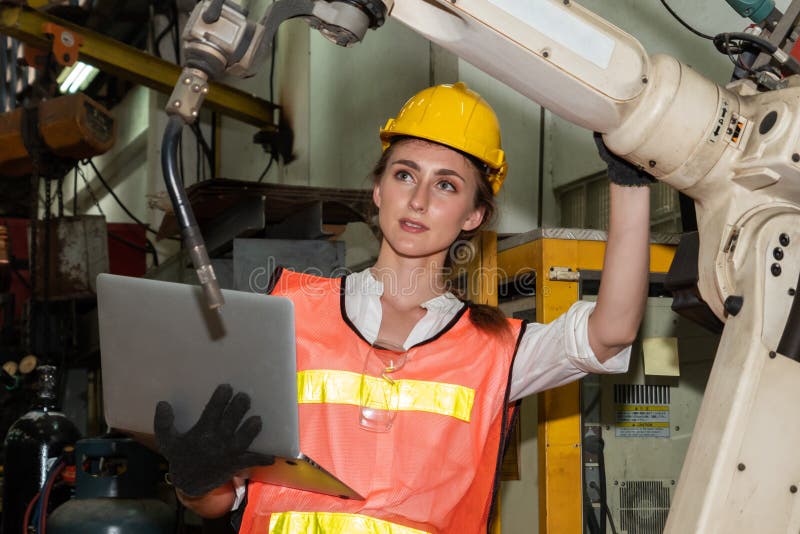 Smart Factory Job Worker Control Robotic Arm in Manufacturing Workshop ...