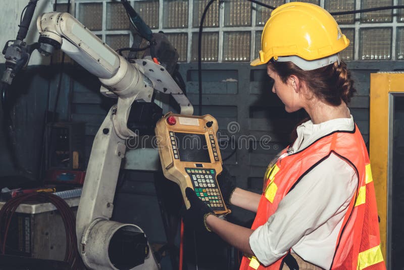 Smart Factory Job Worker Control Robotic Arm in Manufacturing Workshop ...