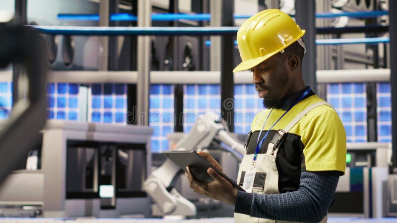 Smart Factory Mechanic Testing Automated Systems, Doing Preventive ...