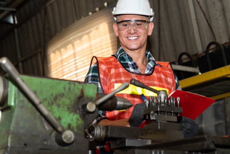 Smart Factory Worker or Engineer Do Machine Job in a Manufacturing ...