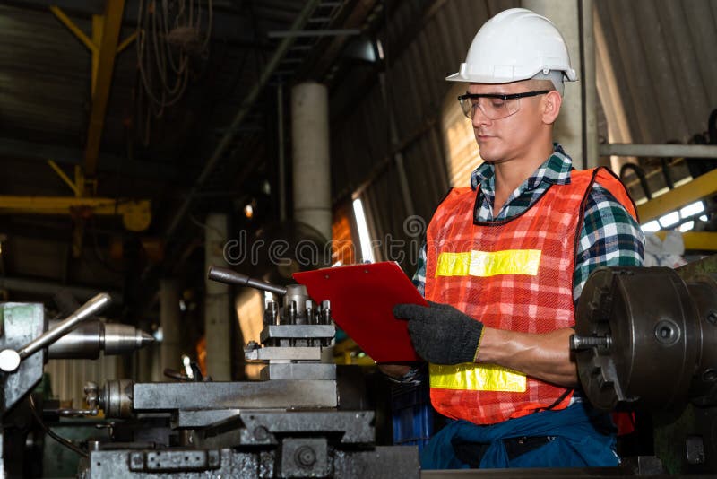 Smart Factory Worker or Engineer Do Machine Job in a Manufacturing ...