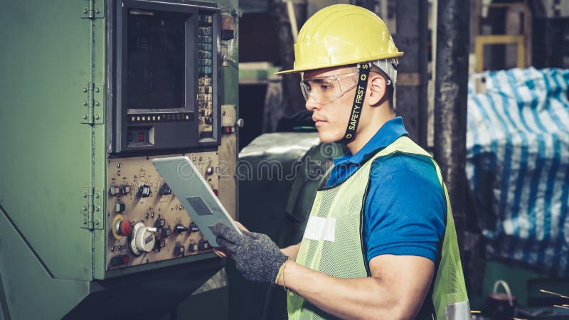 Smart Factory Worker Using Machine in Factory Workshop Stock Photo ...