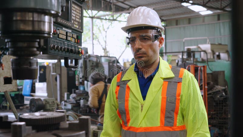 Smart Factory Worker Using Machine in Factory Workshop Stock Photo ...
