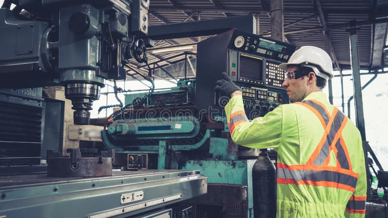 Smart Factory Worker Using Machine in Factory Workshop Stock Image ...