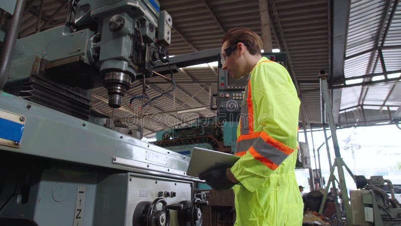 Smart Factory Worker Using Machine in Factory Workshop Stock Photo ...