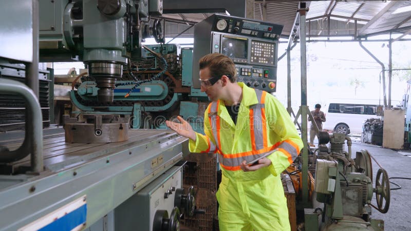 Smart Factory Worker Using Machine in Factory Workshop Stock Image ...