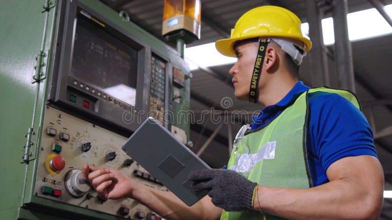 Smart Factory Worker Using Machine in Factory Workshop Stock Photo ...