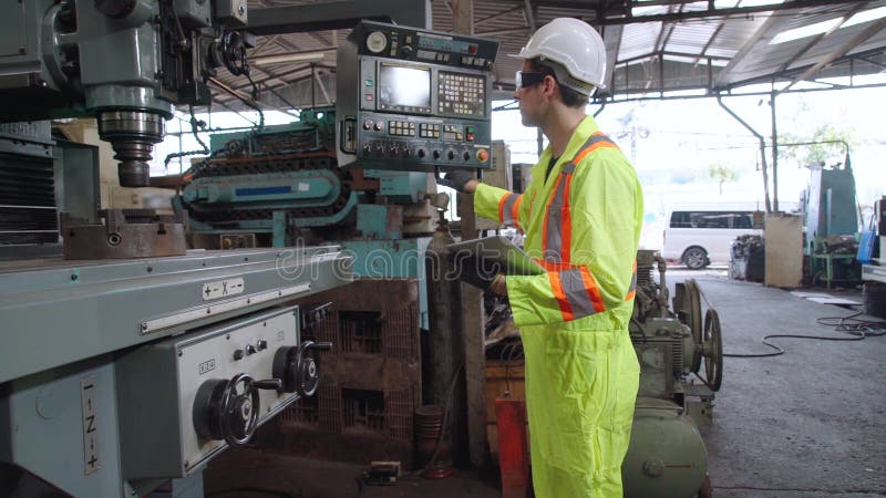 Smart Factory Worker Using Machine in Factory Workshop Stock Image ...