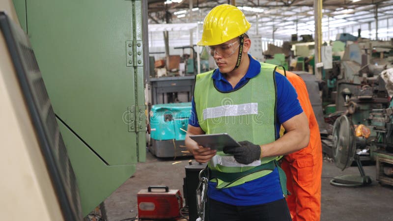 Smart Factory Worker Using Machine in Factory Workshop Stock Image ...