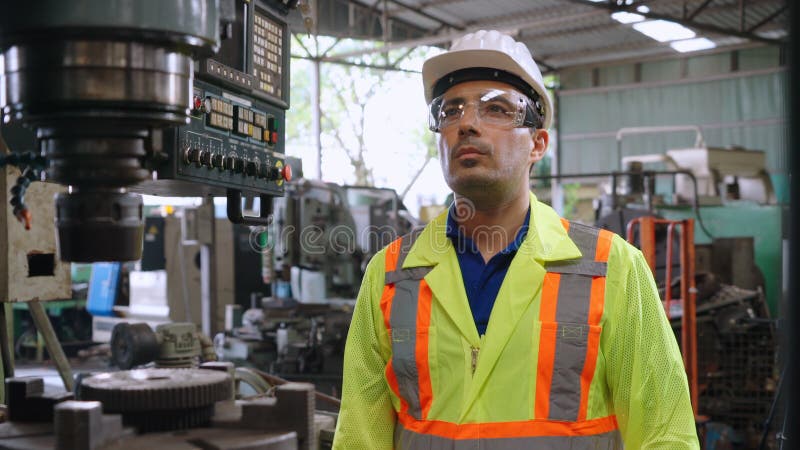 Smart Factory Worker Using Machine in Factory Workshop Stock Photo ...