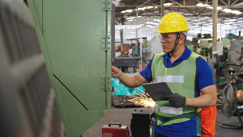 Smart Factory Worker Using Machine in Factory Workshop Stock Image ...