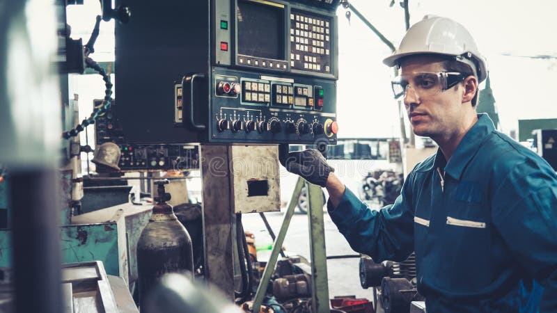 Smart Factory Worker Using Machine in Factory Workshop Stock Photo ...