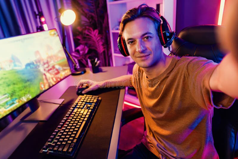 Smart Gaming Streamer Looking at Camera with Playing Battle Team ...