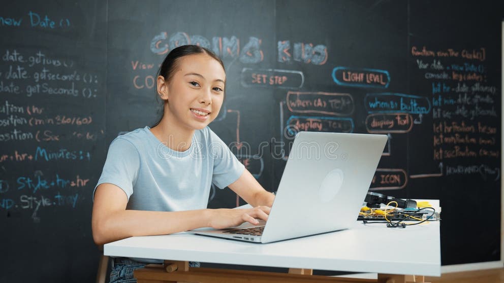 Cute Asian Girl Programing System by Using Laptop at Blackboard ...