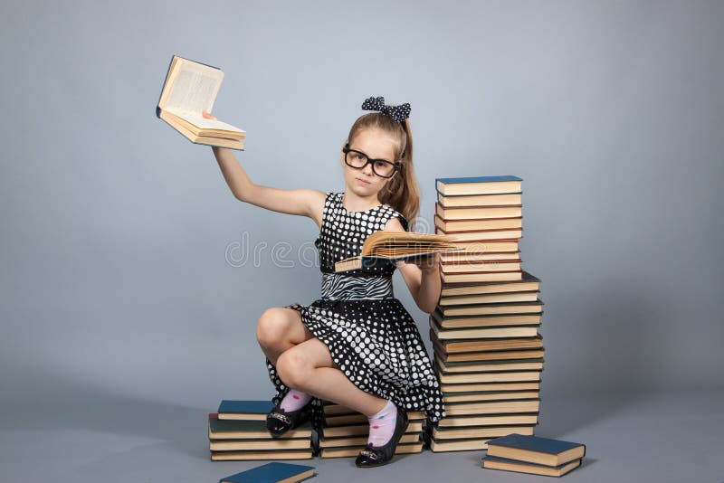 Smart Girl with a Stack of Books. Stock Image - Image of elementary ...