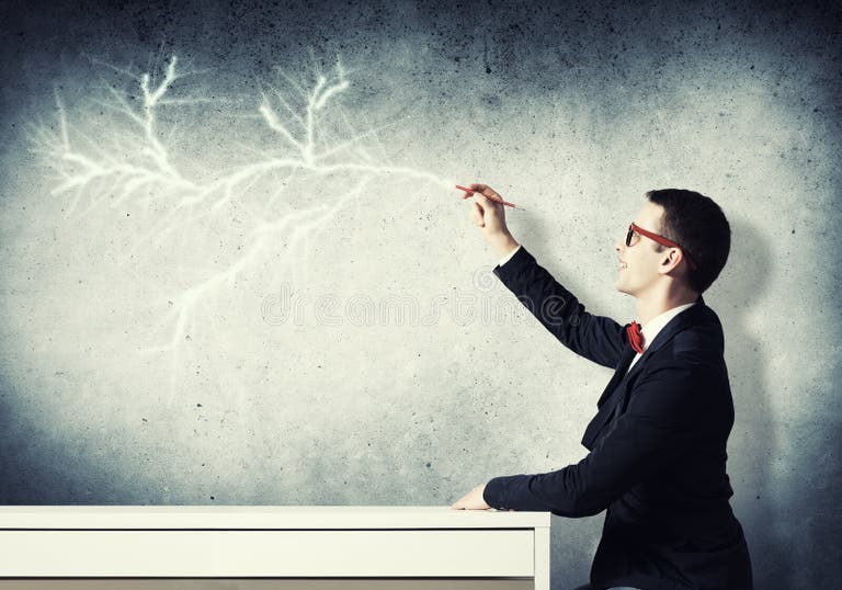 Smart guy draw on wall stock photo. Image of great, intelligent - 65988742