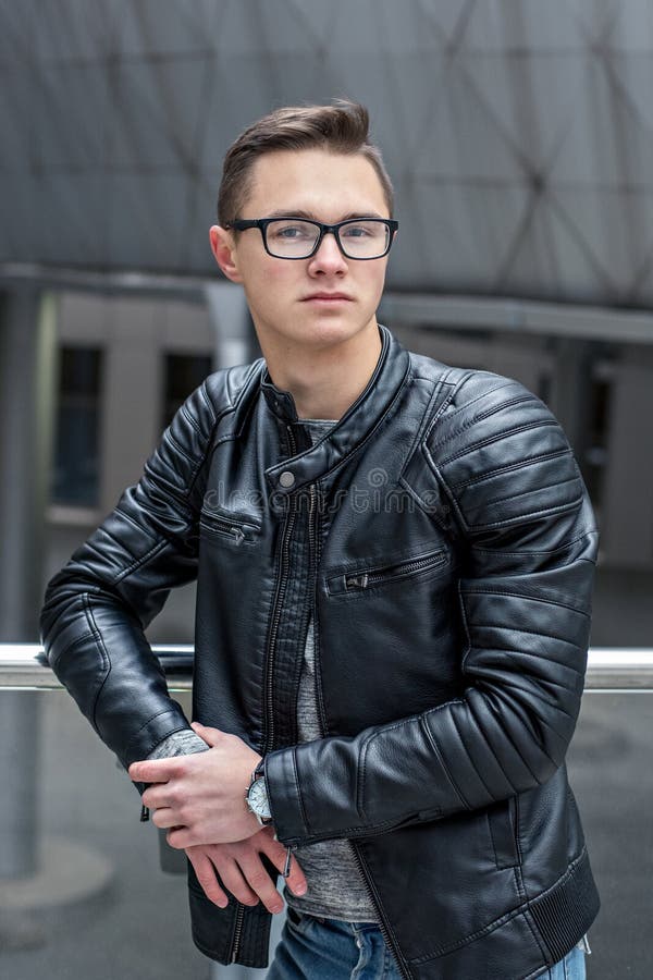 Smart Guy in Eyeglasses and Black Leather Jacket in Front of the ...